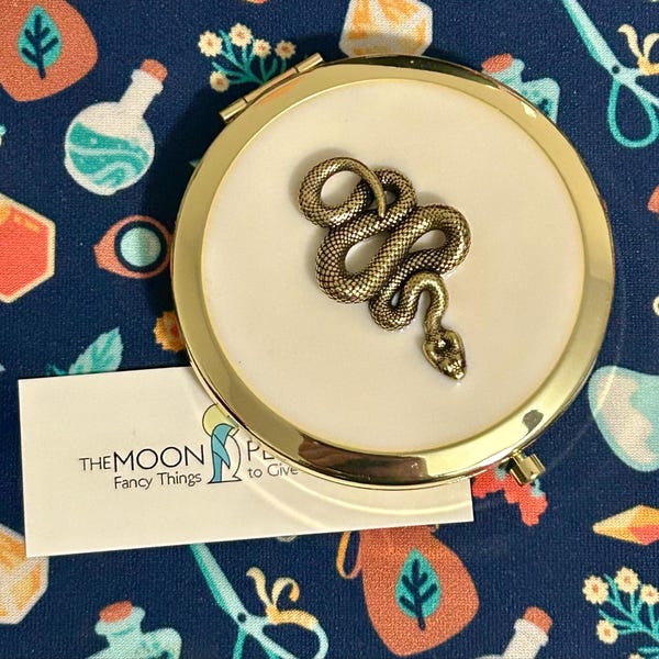 Pill Box With Daisy on a Glossy French Blue Resin Background, Hand ...