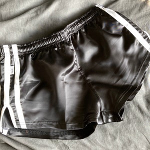 Runway to Retro: Sporty Sprint-inspired Silver Nylon Satin High Cut ...