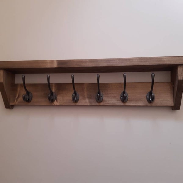 Wooden Breakfast Bar Wall Mounted on Stylish Steel Brackets With a ...