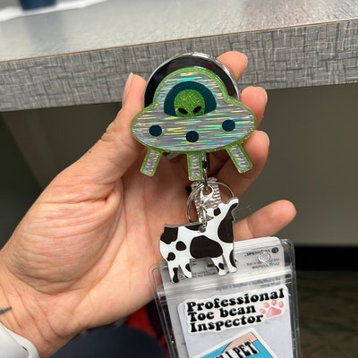 The Original UFO Alien Cow Abduction Funny Retractable Badge Reel Glow ...