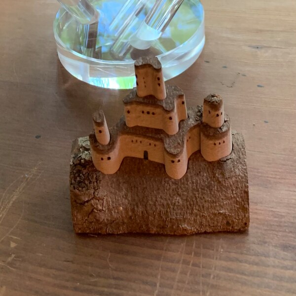 Wooden Pop up Castle Carved From a Garden Tree Log Expending Into a ...