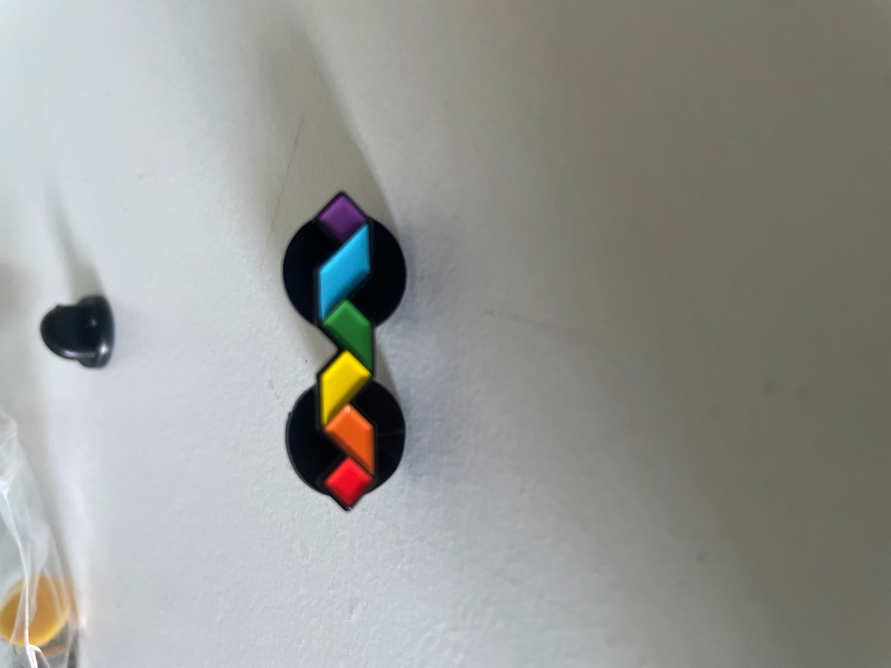 The Rainbow Twist Enamel Pin