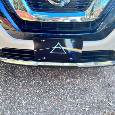 Sasquatch and an Alien Celebrating Conspiracy Novelty Front License ...