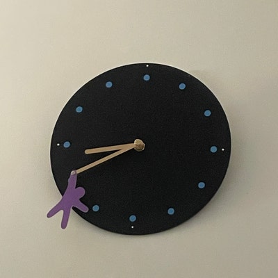 Fuchsia Hanging Man Wall Clock - Etsy