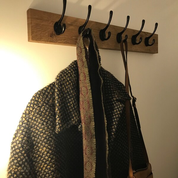 Wooden Breakfast Bar Wall Mounted on Stylish Steel Brackets With a ...