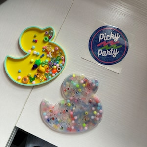 Duck Picky Party Pad™ and Tray Satisfy Your Urge to Pick, Pop and Peel ...