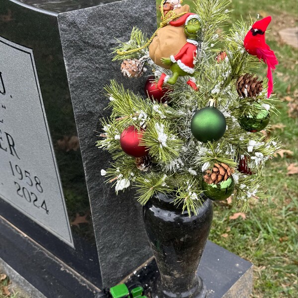This Headstone Saddle Has Silk Grave Flowers Including Cream Calla ...