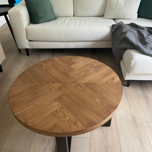 Round Rustic Wood Herringbone Pattern Coffee Table With Black Wood Legs ...