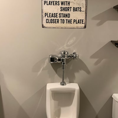 Funny Bathroom Sign, Players With Short Bats Stand Closer to Plate ...