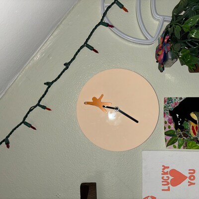 Fuchsia Hanging Man Wall Clock - Etsy