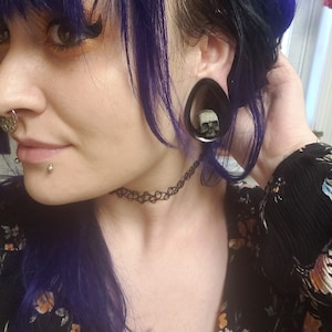 Black Ear Tunnels With Human Skull Ebonite Teardrop Tunnels Skull ...