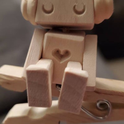 Tiny Robot Clothespin Automaton Flying a Kite it Pulls on the Kite ...