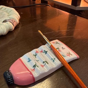 Handmade Ceramic Brush Rest: Paint Tube With Flower Accents - Etsy