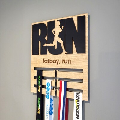 Sports Clipart: Bold Black Word run With Cutout Silhouette of Male ...