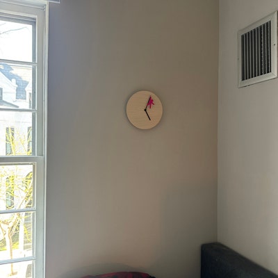 Fuchsia Hanging Man Wall Clock - Etsy