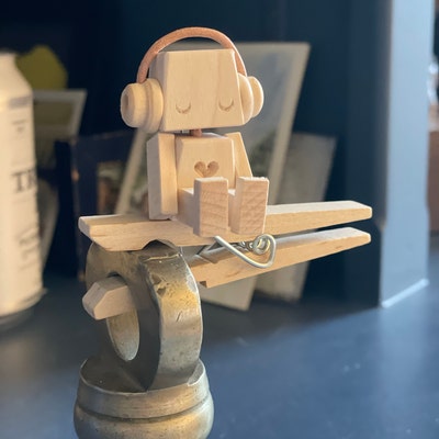 Tiny Robot Clothespin Automaton Flying a Kite it Pulls on the Kite ...