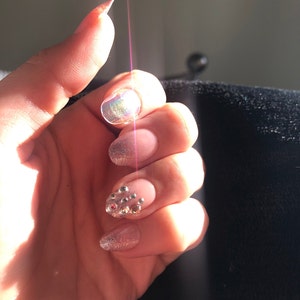 Stunner Made With Genuine Swarovski Crystals Round Medium Length Press ...