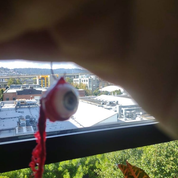 Realistic Human Ripped Out Eyeball on a Hook Ornament - Santa's ...