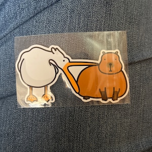 Pelican Bites Capybara Meme Sticker / Glossy & Holo Stickers - Etsy
