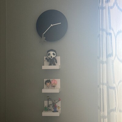 Fuchsia Hanging Man Wall Clock - Etsy