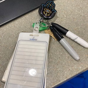 Scribepad A Dry-erase Notepad Attached to a Retractable Badge Reel and ...