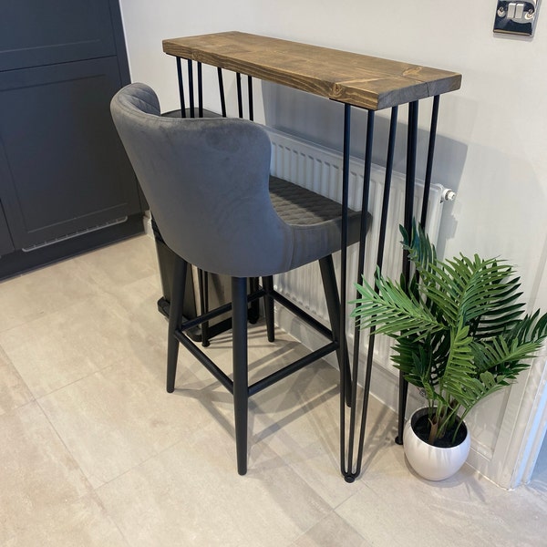 Wooden Breakfast Bar Wall Mounted on Stylish Steel Brackets With a ...