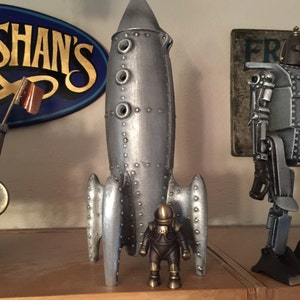 Moon Rocket Coin Bank With One Spaceman Item 924, Cast Aluminum and ...