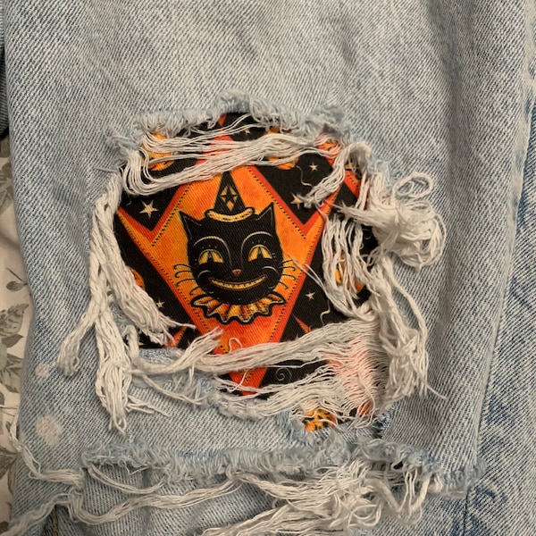 Retro Cat Clown Fabric - Grinning Black Cat Jacks by ...