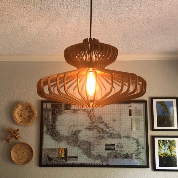 Artisan Hanging Light Fixture in Wood, Providing Ambient Lighting for ...