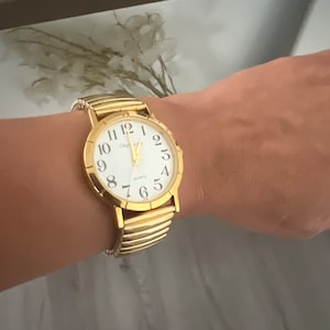 Oleg Cassini Men's Gold Watch Oval Dial With Index Hour Marker's on a ...