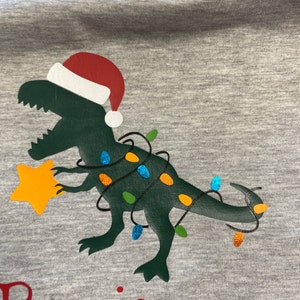 Christmas Dinosaur Svg, Santa T-rex Svg, Holiday Dino With Lights Svg ...