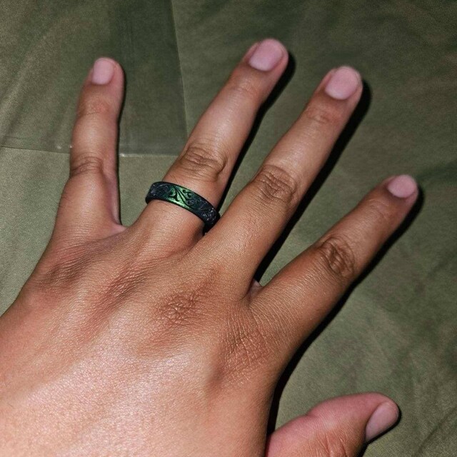 Black ring on index finger store
