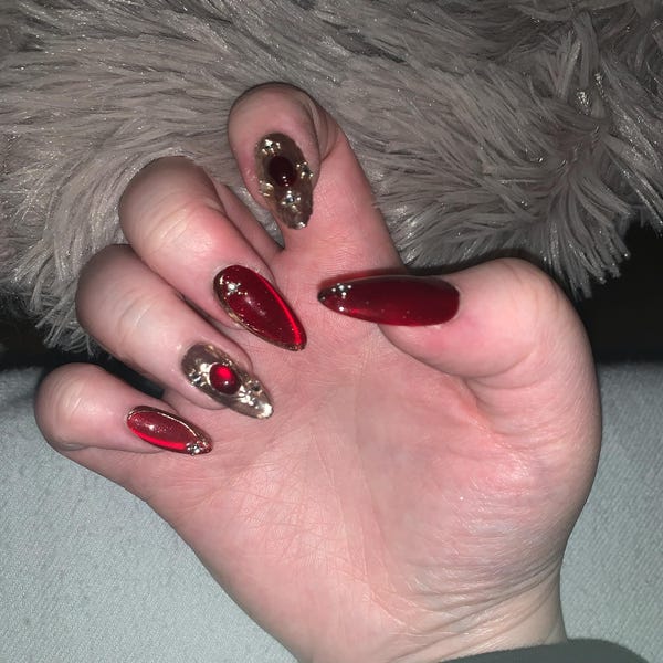 Deep Red Cat Eye and Champagne Chrome Nails | Unique Nail Design ...