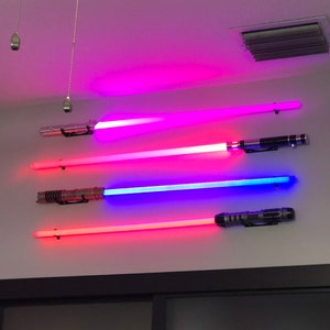 Horizontal Lightsaber wall mount lightsaber mount | Etsy