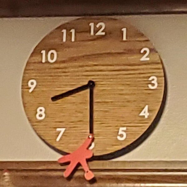 Minimalist Wall Clock With CLOCK FACE - Hanging Man - Wall Decoration ...