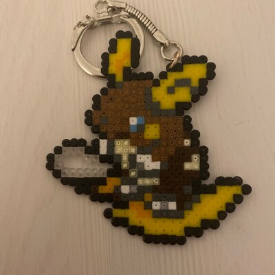 Pichu, Pikachu, Raichu and Alolan Raichu Pokemon Keychains, Pins ...