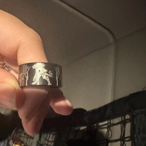 Howling Wolf in Front of Full Moon on a Boulder Rock Forest Tree Scene ...