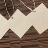 500 Custom Pure White Hang Tags Embossing Logo Swing Tags for Clothing ...