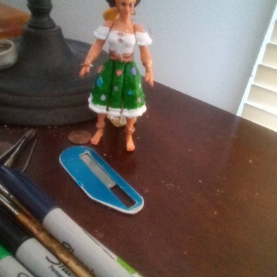 Batcave Trophy Room With Robin Memorial, Giant Penny, Penguin, and ...