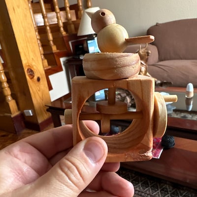 Tiny Robot Clothespin Automaton Flying a Kite it Pulls on the Kite ...