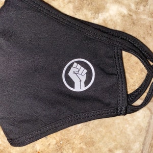 BLM Reusable Cloth Face Mask Covering, Black Lives Matter Fist Logo 2 ...