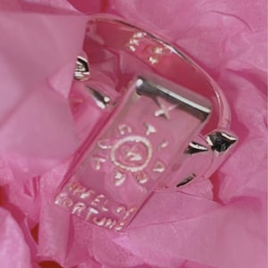 Pink tourmaline and red garnet band ring with two evil eyes | Etsy