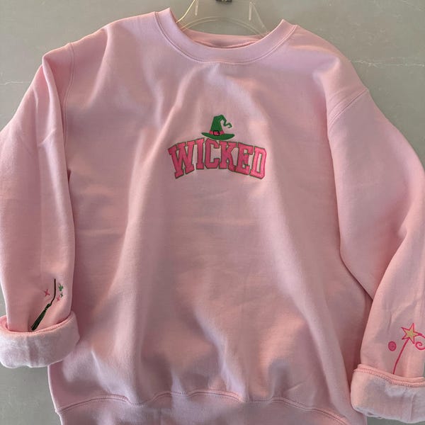 Wicked Defy Gravity Embroidered Sweatshirt, Witch Pink and Green ...