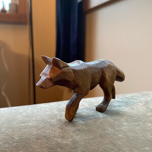 Hand Carved Lying Down Wolf - Etsy