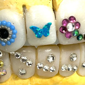 18k Gold LOGO Tooth Gems - Etsy