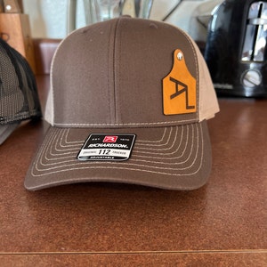 YOUR BRAND Leather Ear Tag Trucker Hat Personalized With - Etsy
