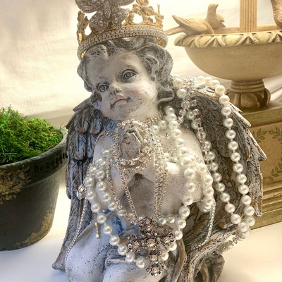 Cherub Holding Bird Crowned Cherub Cherub With Crown Winged Cherub ...