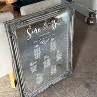 Mirror Wedding Table Plan With Modern Calligraphy Fonts • Seating Chart ...