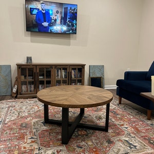 Round Rustic Wood Herringbone Pattern Coffee Table With Black Wood Legs ...
