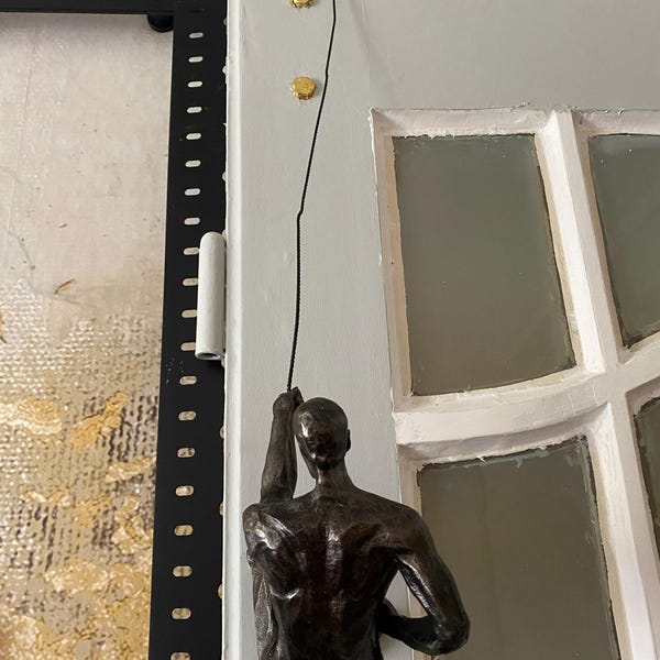 Large Bronze Colour Climbing Abseiling Man Hanging on Wire With Left ...